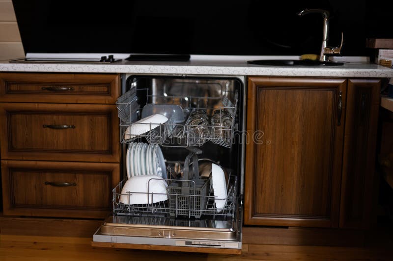 Open Dishwasher with Clean Dishes in Wooden Surface Kitchen Stock Image ...