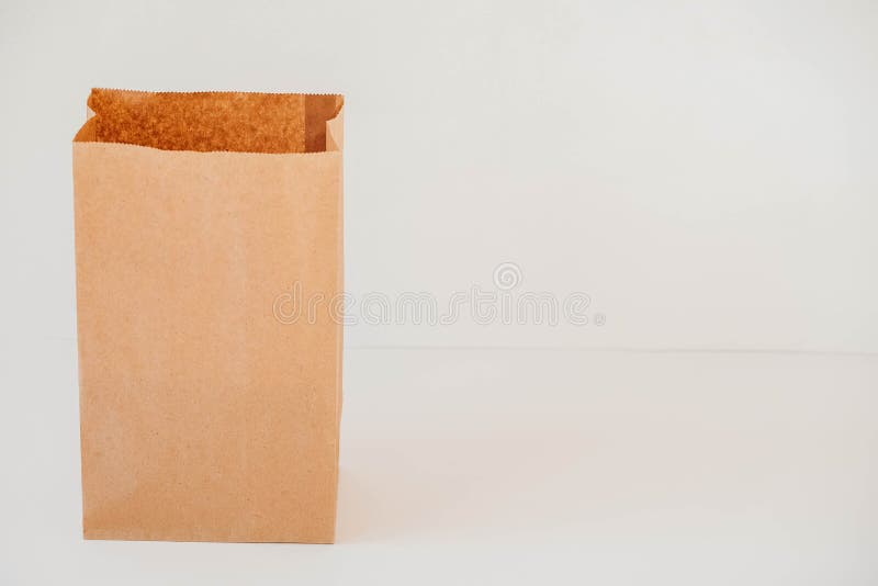 Open Disposable Package Made of Brown Kraft Paper on a White Background ...