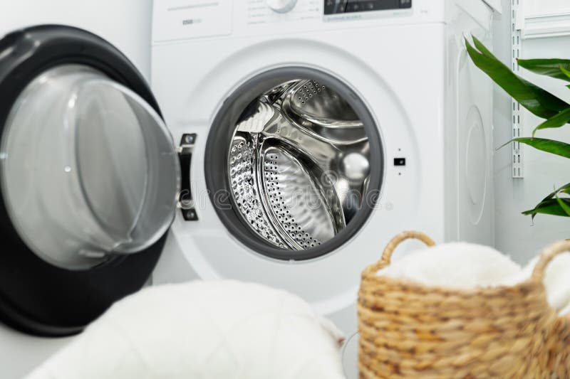 Open Door of Front Load Washing Machine in Laundry Room Stock Photo ...