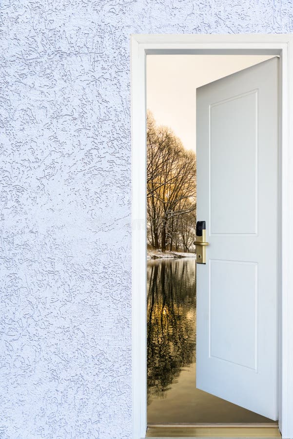 Open Door with a View of Green Meadow Illuminated Stock Photo - Image ...
