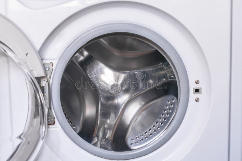 The Open Door of the Washing Machine is a Close-up. Empty Drum Washer ...