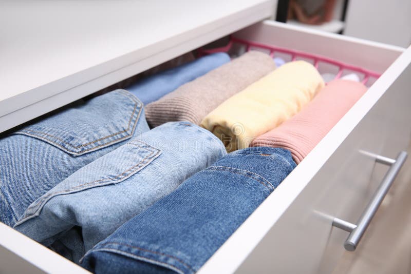 Open Drawer with Folded Clothes Indoors, Closeup. Vertical Storage ...