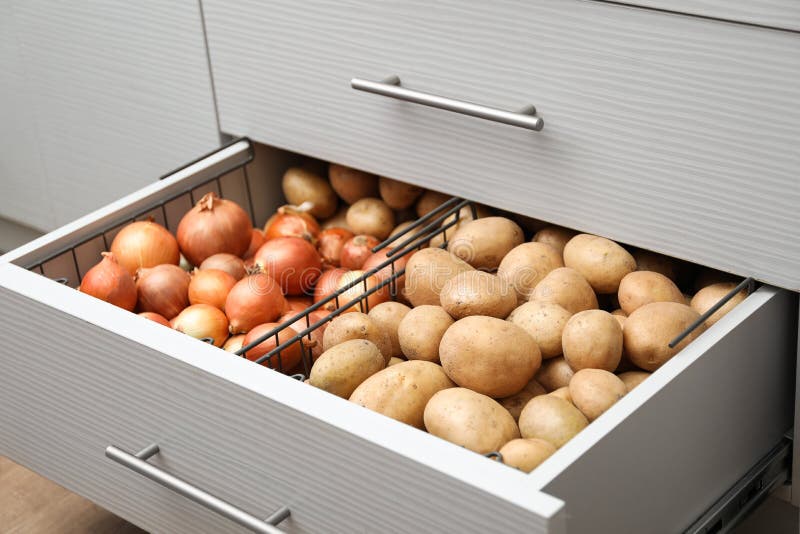 Open Drawer with Potatoes and Onions in Kitchen Stock Image - Image of ...