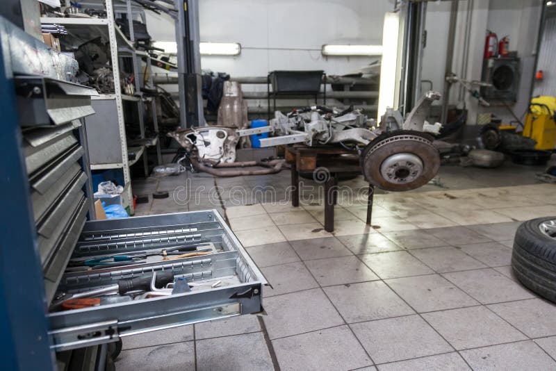 Open Drawer Rack with Tools for Repair and Maintenance of Vehicles in a ...