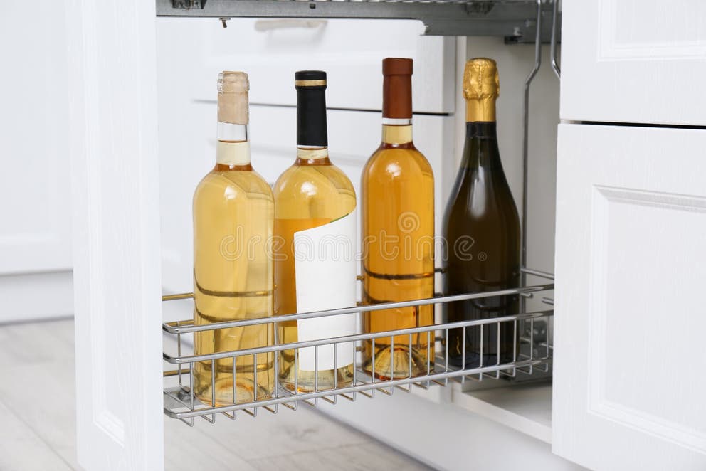 Open Drawer with Wine Bottles in Kitchen Stock Photo - Image of kitchen ...