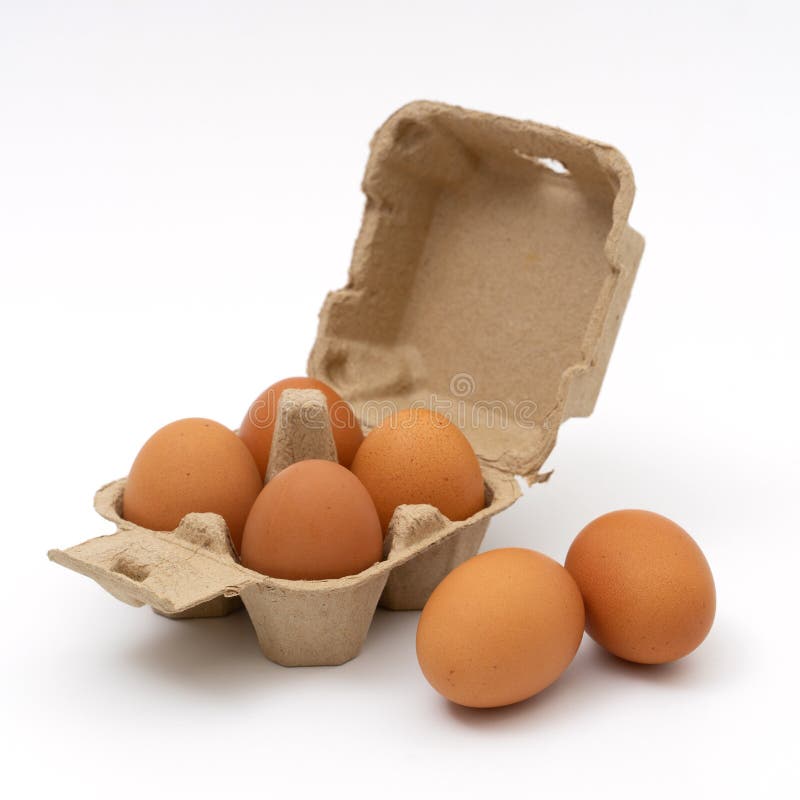Open Egg Box Brown on Yellow Stock Photo - Image of protein, dairy ...