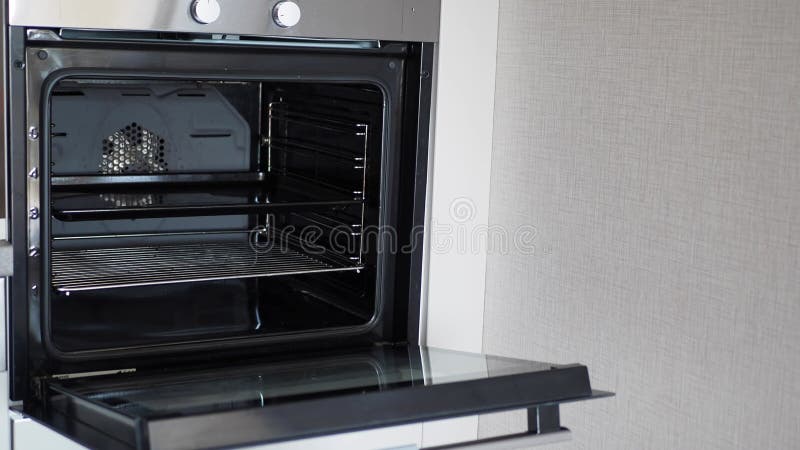 Open electric oven at home stock footage. Video of equipment - 292224104