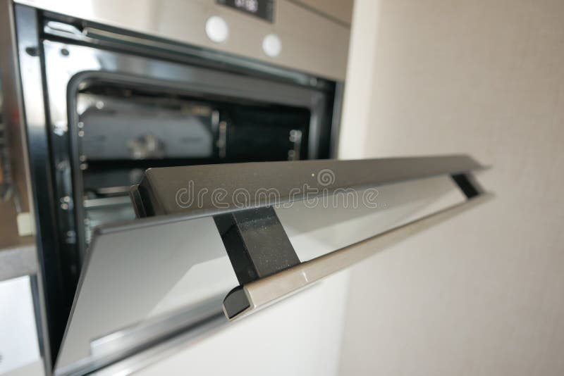 Open electric oven at home stock photo. Image of implement - 295007604