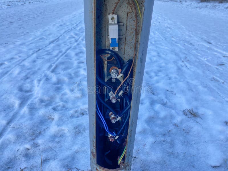 Open Electrical Panel in a Street Pole in Winter Stock Photo - Image of ...