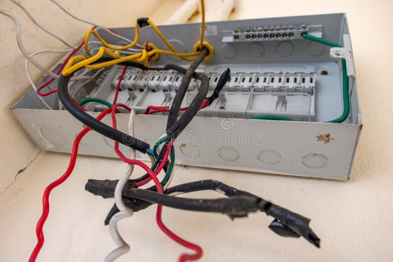A Open Empty Electricity Fuse Box with Cables on White Wall. Stock ...