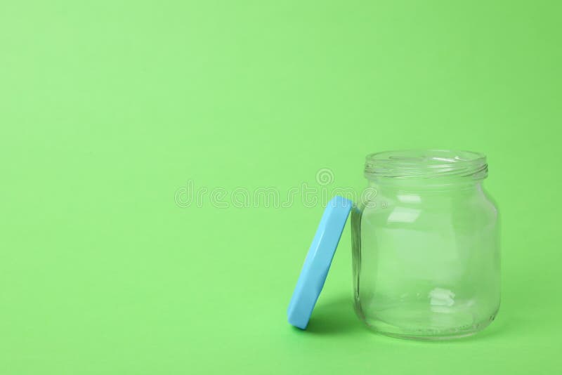 Open Empty Glass Jar on Light Green Background Stock Photo - Image of ...