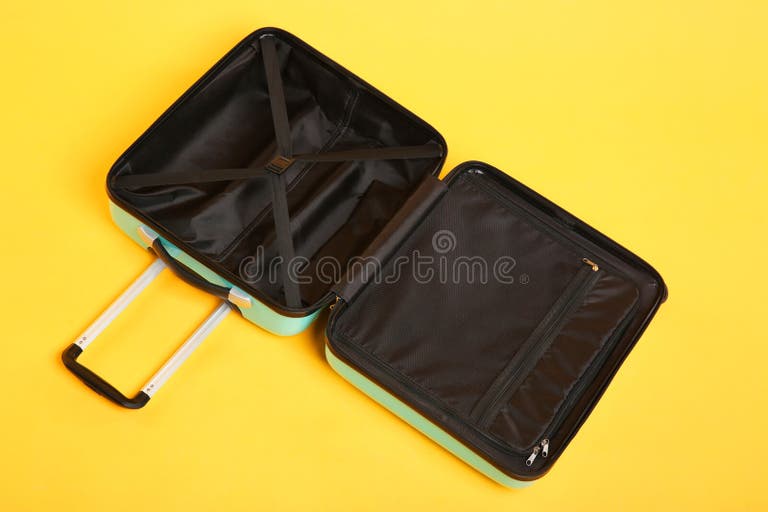 Open Empty Suitcase on Yellow Background, Above View Stock Photo ...