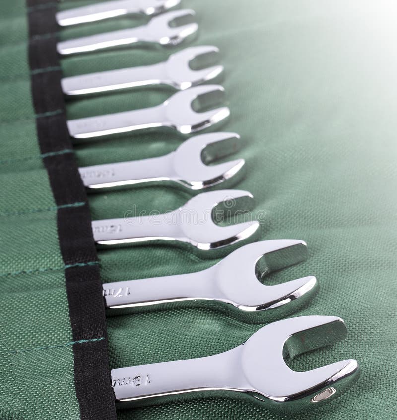 Open End Wrench Set on Green Cover on Sunlight. Close Up Stock Image ...