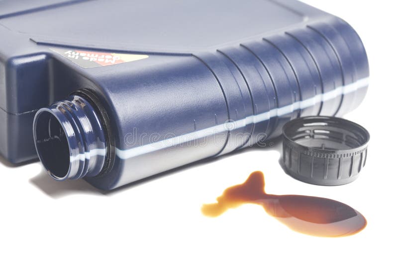 Open Engine Oil Bottle with a Puddle of Engine Oil Isolated on White ...