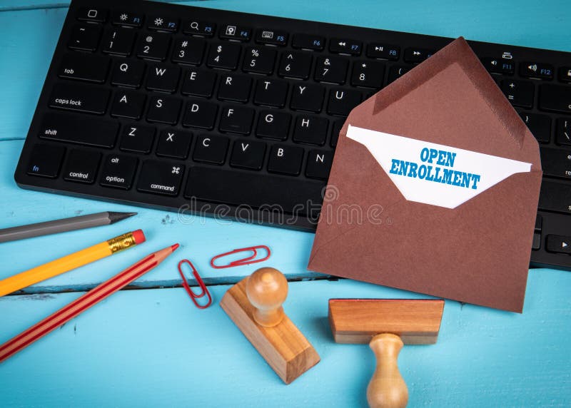 Open Enrollment. Brown Letter Envelope on Black Computer Keyboard Stock ...