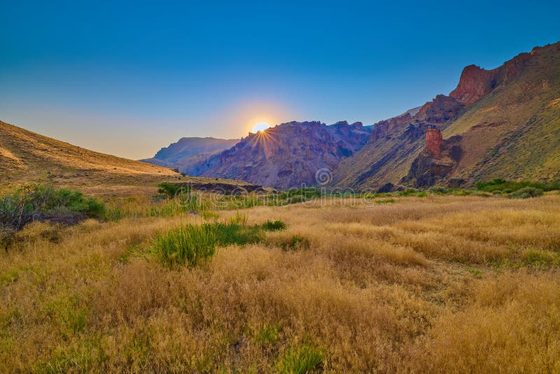 Open Field with Sunrise at Birch Creek Ranch, Oregon Stock Image ...