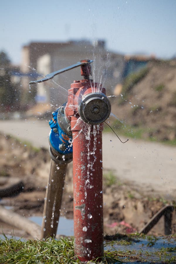 Open Fire Hydrant Spraying High Pressure Water Stock Image - Image of ...
