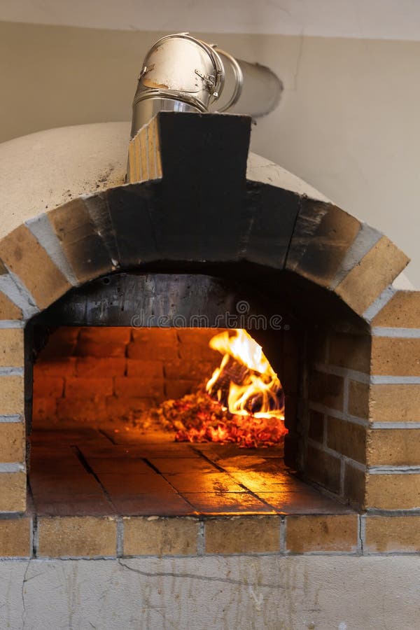 Open Fire Pizza Oven. Beautiful Brick Oven in the Restaurant Stock ...