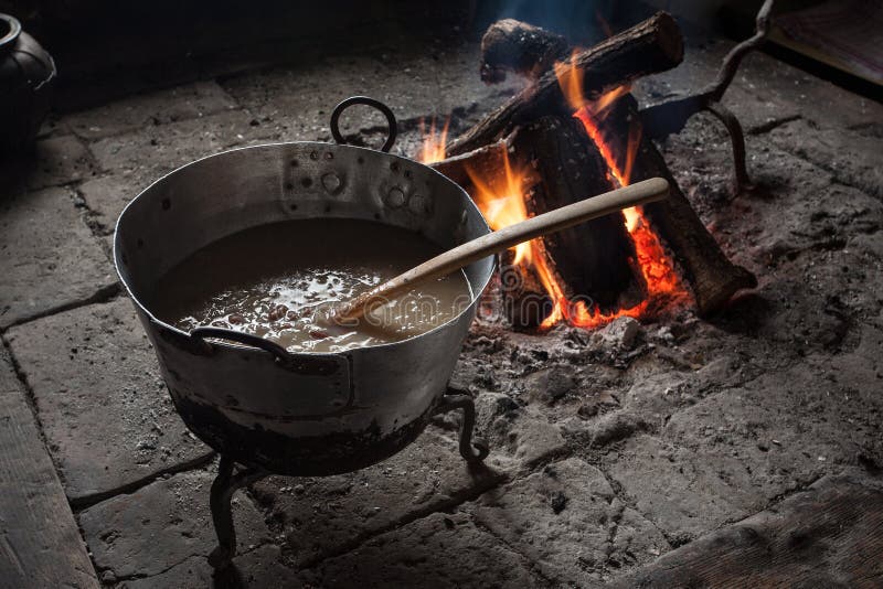 Cooking on Open Hearth stock photo. Image of cook, rough - 49513106