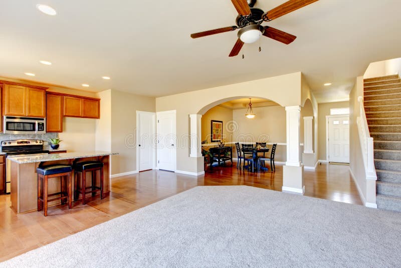 Open Floor Plan. View of Kitchen, Dining Room and Entryway Stock Image ...