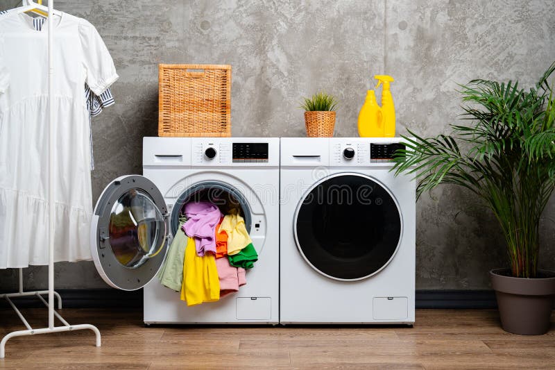 Open Front Loading Washing Machine with Colorful Clothes Stock ...