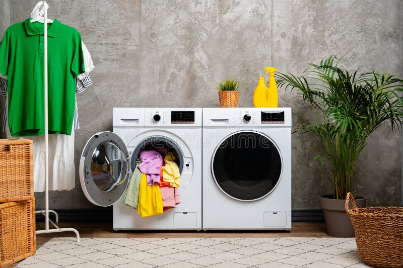 Open Front Loading Washing Machine with Colorful Clothes Stock Image ...