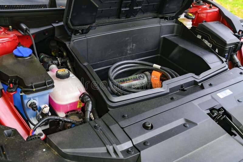 Open Frunk of an Electric Car with Adapter for Charging Editorial Photo ...