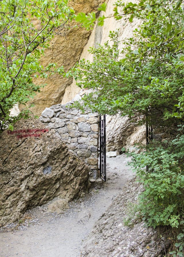 An open gate on the path. stock image. Image of cliff - 101847481