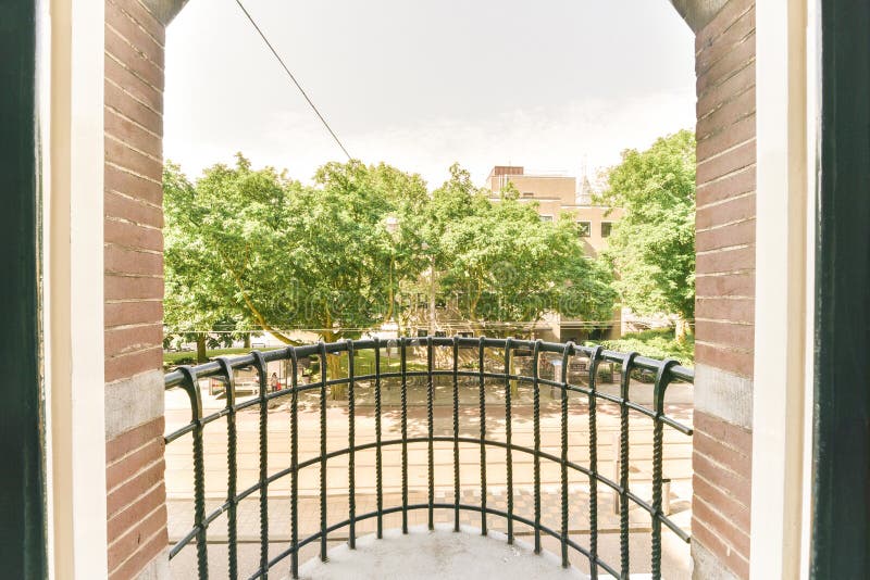 A View of a Balcony with a Fence and Trees Editorial Image - Image of ...