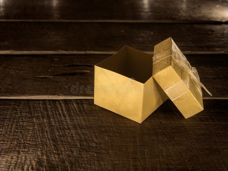 Open Christmas White Gift Box with Ray of Magic Light on Wood Desk ...