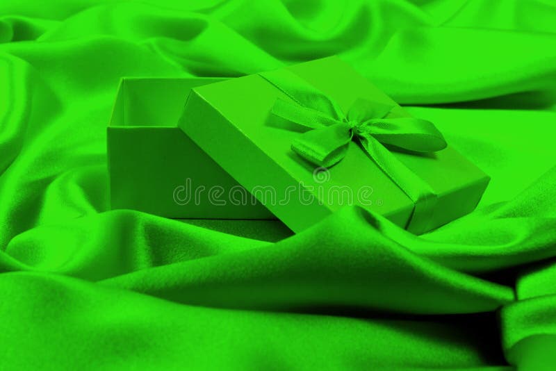 Open Green Gift Box on Luxurious Green Silk Stock Image - Image of ...