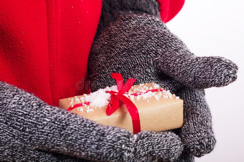 Open Hands Holding a Present Wrapped with a Red Ribbon Stock Photo ...