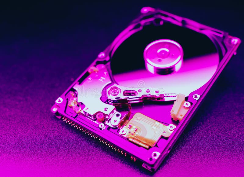 An Open Hard Disk Disassembled HDD of a Computer or Laptop Lies on a ...