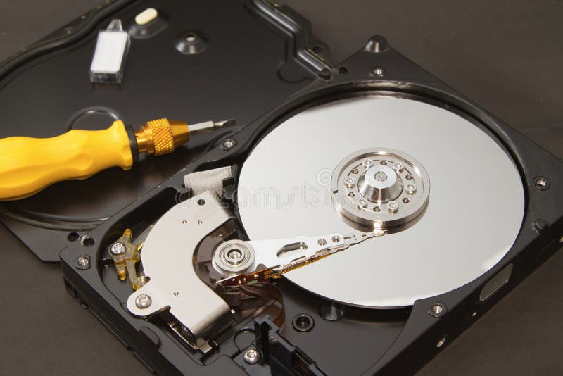 Open hard drive for repair stock image. Image of writing - 30911229