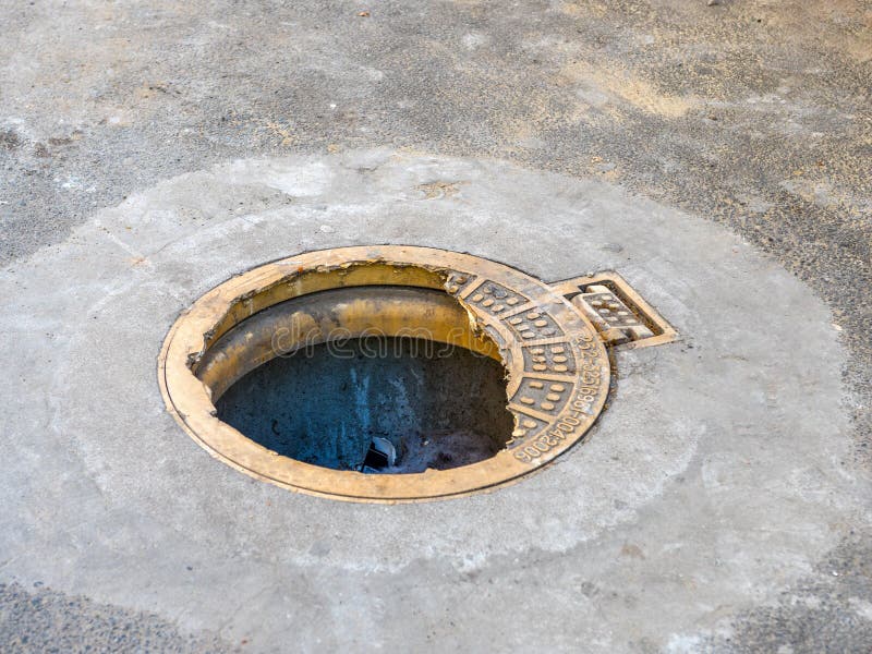 An Open Hatch. Broken Manhole Plastic Cover. Stock Image - Image of ...