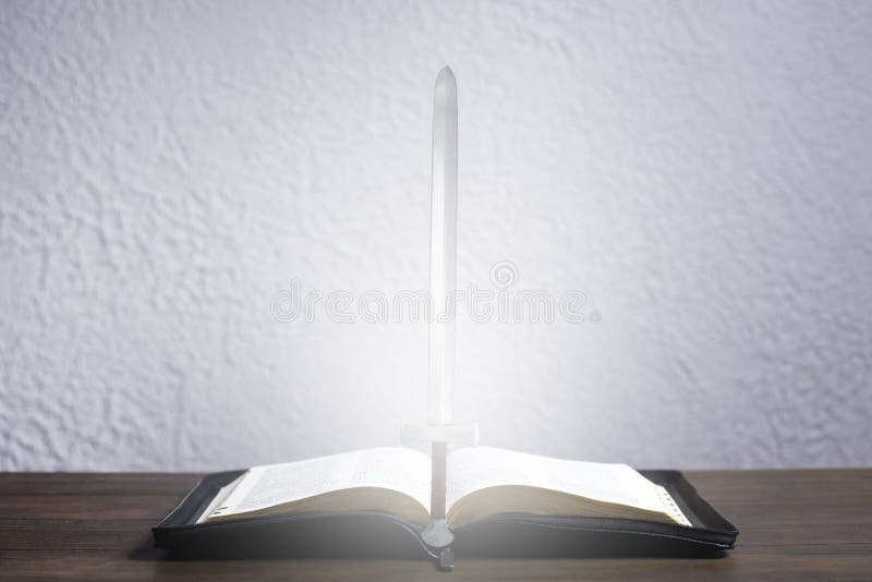 An Open Holy Bible on the Table. the Word of God is a Sword. Stock ...