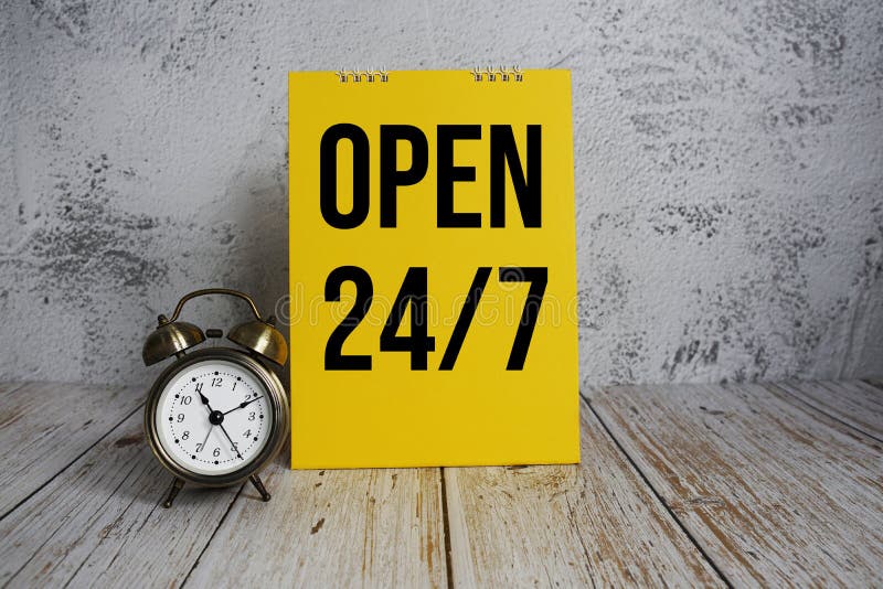 Open 24 Hrs. 7 Day Service Text Message and Alarm Clock on Wooden ...