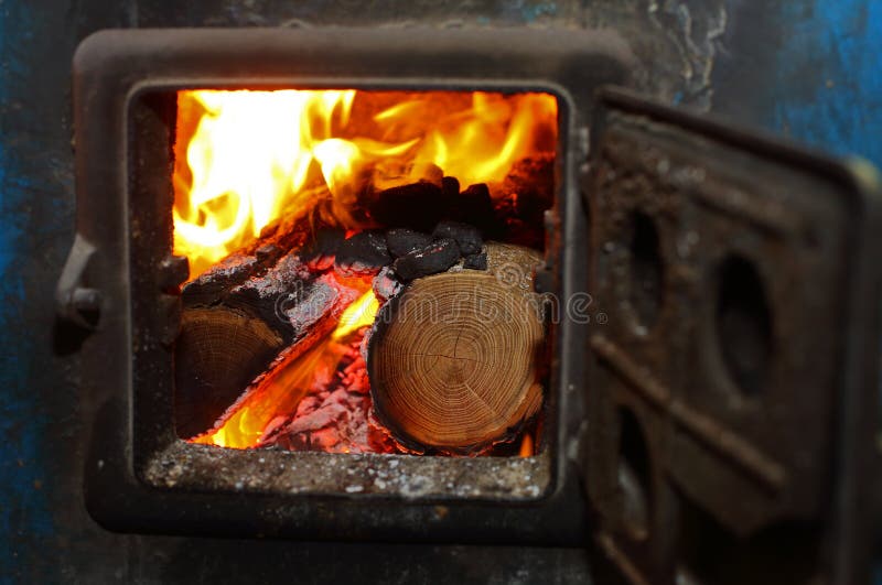 Open iron stove stock image. Image of firewood, flare - 127064867