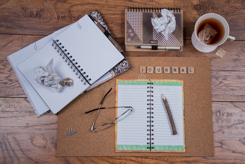 Open Journal Books on Desk stock photo. Image of book - 80754750