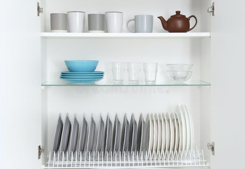 Open Kitchen Cabinet with Different Clean Dishware Stock Image - Image ...