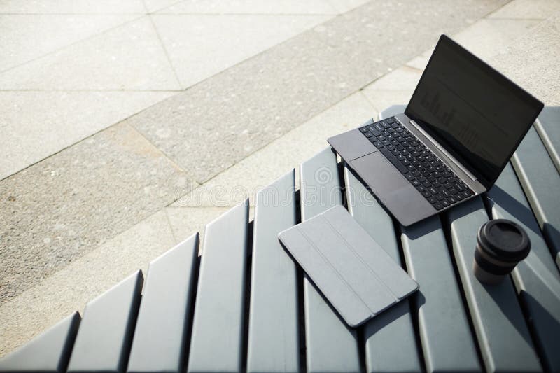 Open Laptop with Coffee Mug on Outdoor Bench Stock Photo - Image of ...
