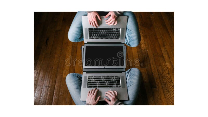 An Open Laptop Computer on Your Lap and Its Reflection. Stock Photo ...