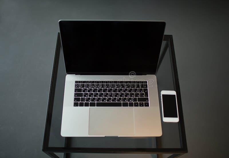 Open Laptop Computer and Modern Mobile Phone with Empty Screens Lying ...