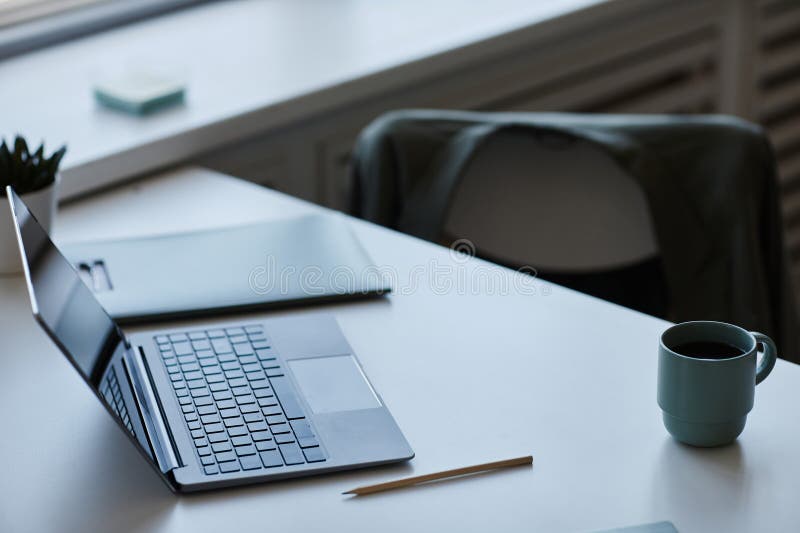 Open Laptop on Desk at Empty Office Workplace Stock Image - Image of ...