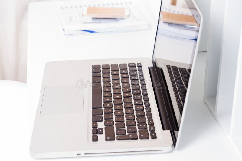 Open laptop on desk stock image. Image of information - 91860387