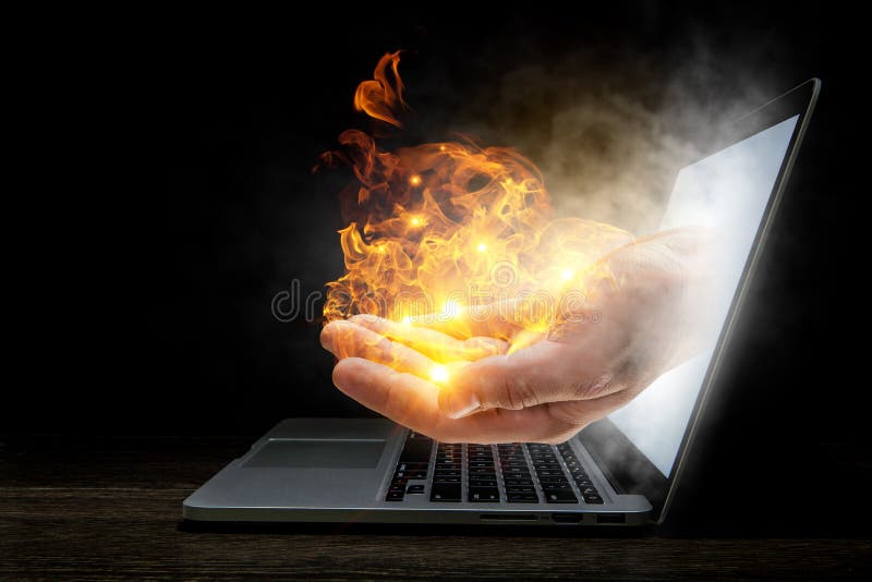 Laptop in fire flames stock image. Image of keyboard - 32884321