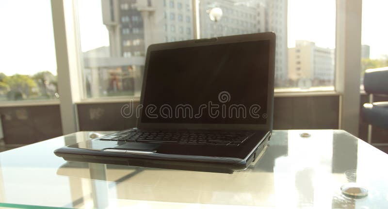 Open Laptop on Glass Table in Modern Office Stock Photo - Image of ...