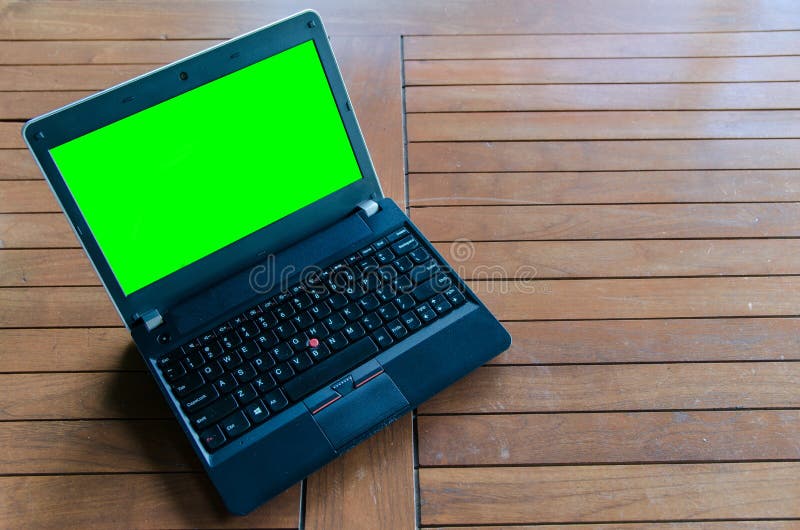 Open Laptop, Notebook with Green Screen Lying on Table Stock Photo ...