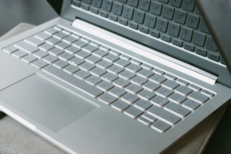 Closeup Laptop Keyboard and Opened Notebook Stock Image - Image of ...