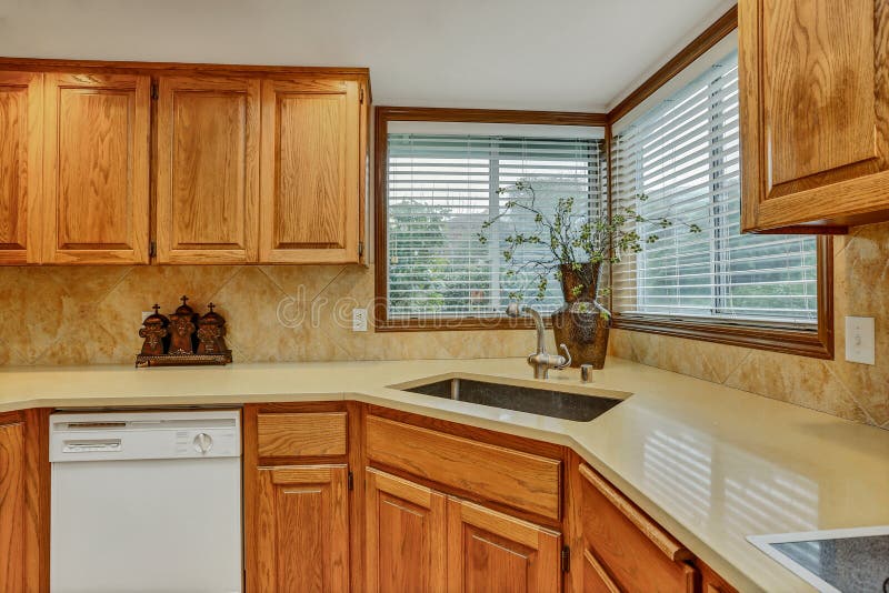 Open Large Kitchen Interior with Vaulted Ceiling and White Appliances ...
